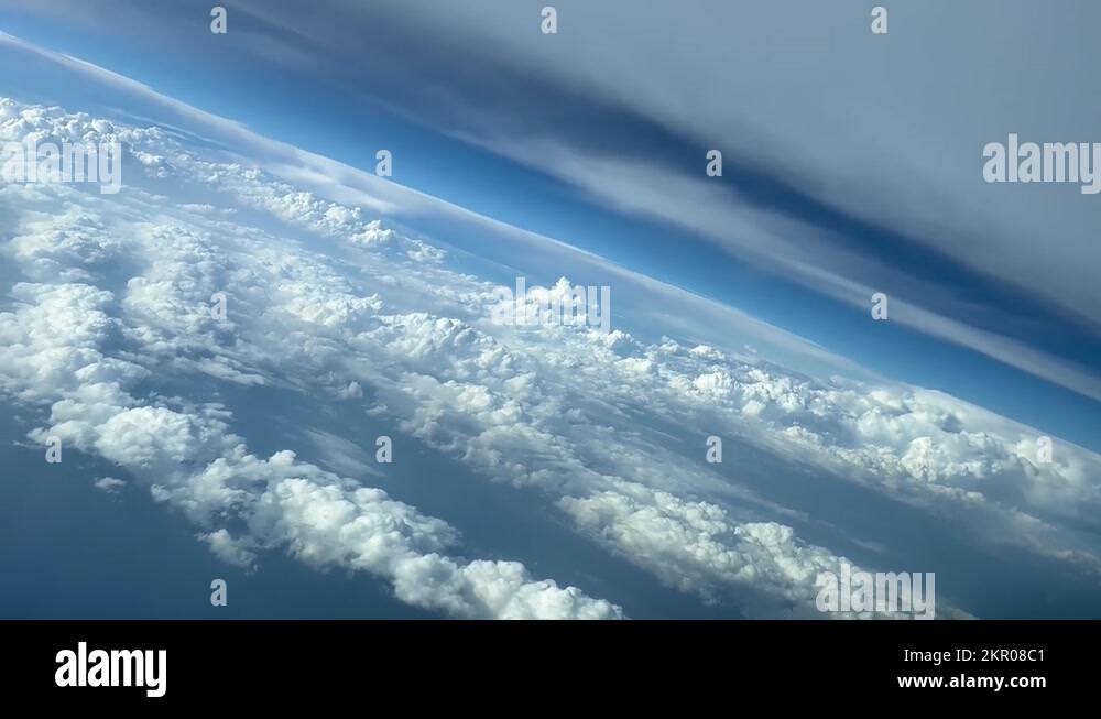 Beautiful sky view from a jet cockpit flying at 12000 metres high with ...