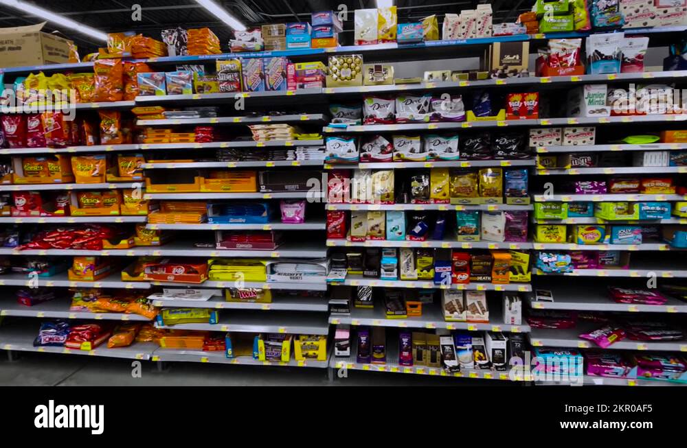 Walmart Retail grocery store interior candy aisle pan Stock Video ...