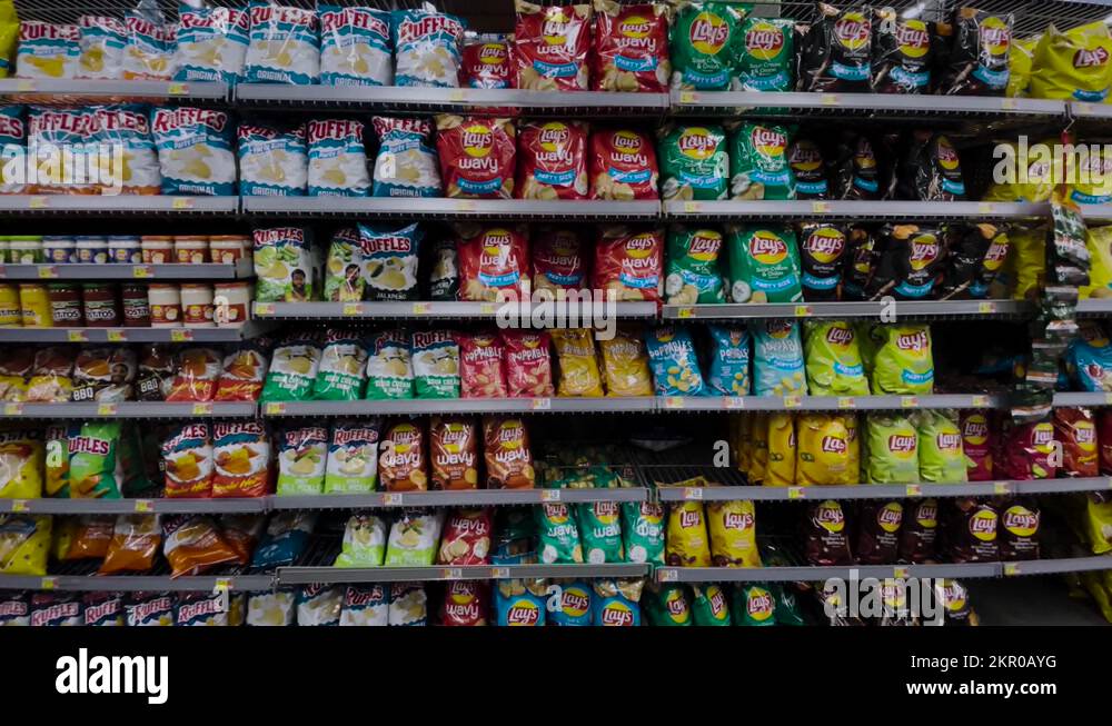 Walmart Retail grocery store interior bag potato chip aisle Stock Video ...