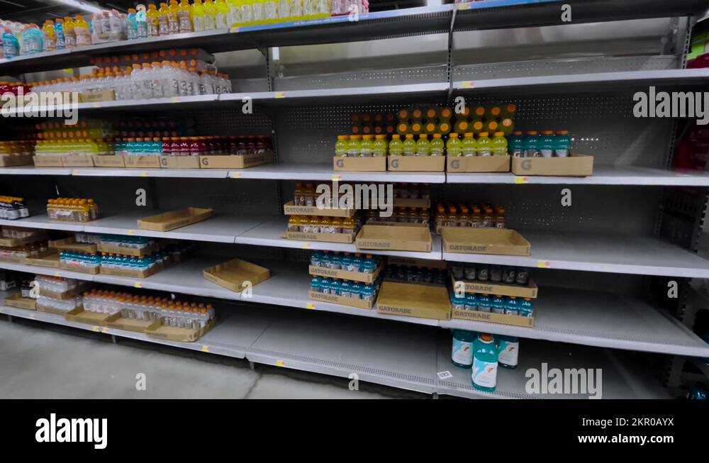 Walmart Retail grocery store interior associates pulling a cart on ...