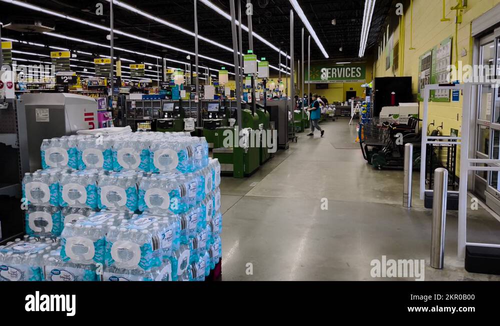 Walmart Retail grocery store interior front of store pan people and ...