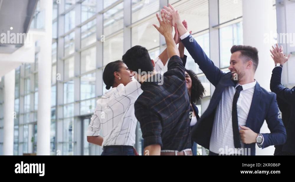 Team of businesspeople high five for success or good teamwork and job ...