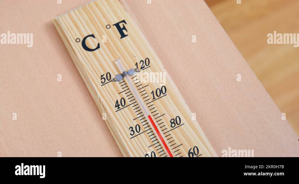 Temperature indicator on wooden thermometer rises quickly Stock Video ...