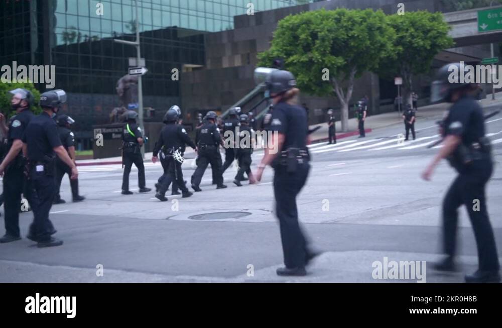 Lines of riot police block off the streets at a BLM protest in Downtown ...