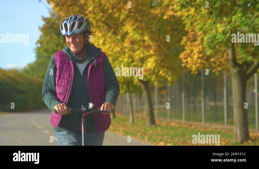 Elderly lady mobility electric scooter Stock Videos & Footage - HD and ...