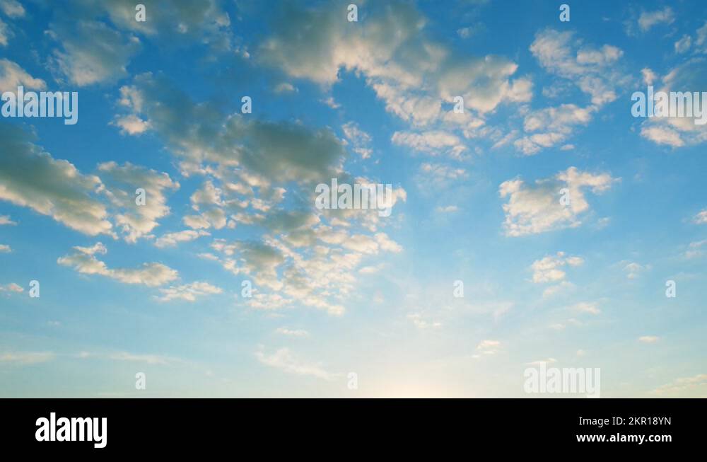 Fiery sunset clouds sky. Clear very nice soft deep blue sky with white ...