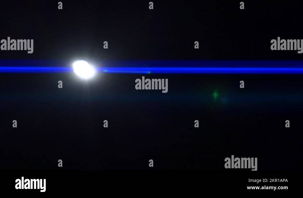 Anamorphic lens flare, bokeh light leaks, flash ray effect over black ...