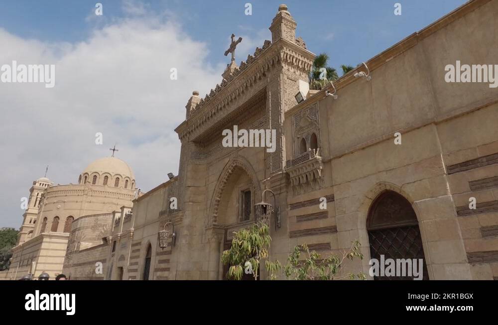 Tilt down on gate facade with St. George's church in Coptic Cairo ...