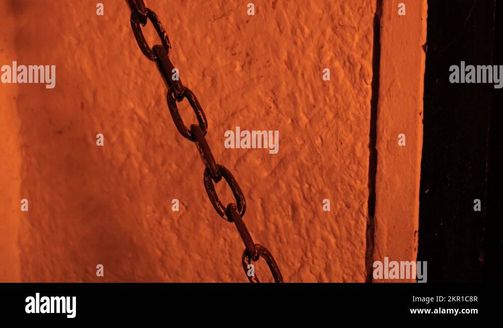 Historice 1800s jail cell with metal bunk and iron cell door in candle ...