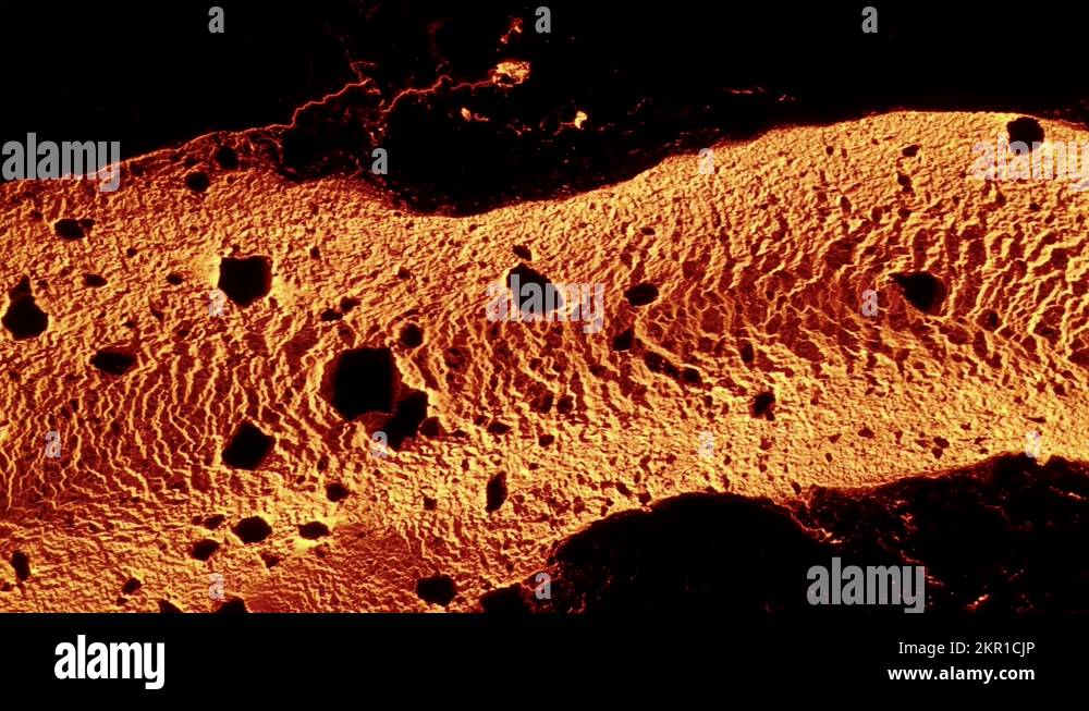 Extreme heat from molten lava river in newly formed earth crust, top ...