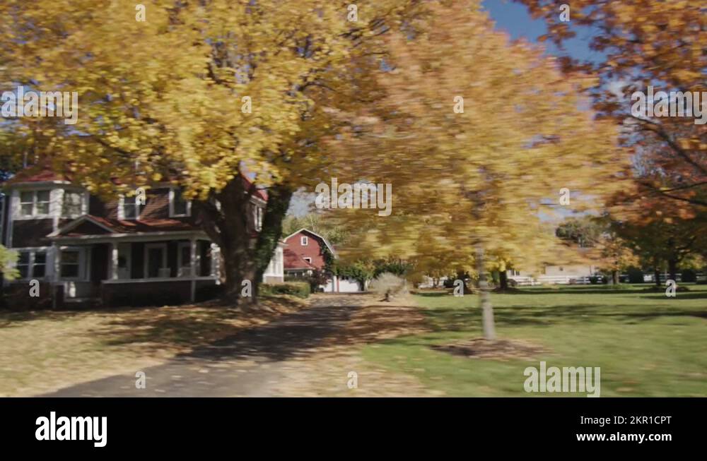 Side View from the window of a car that drives through a typical ...