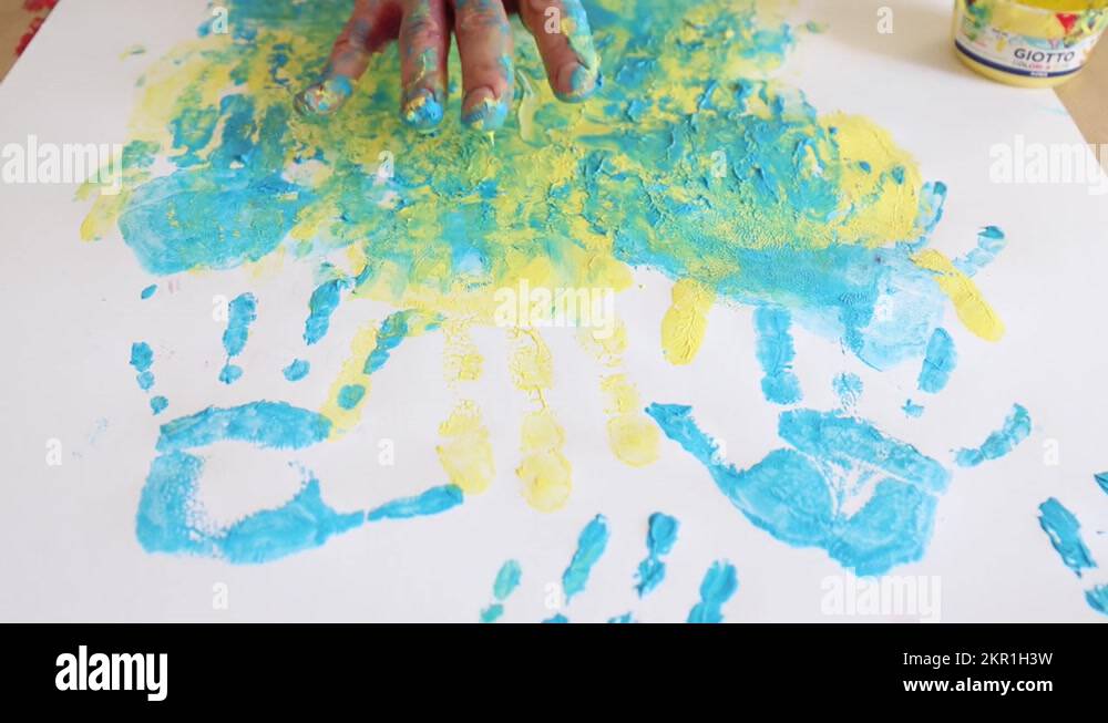 Single hand Ukraine blue and yellow handprint on white paper Stock ...