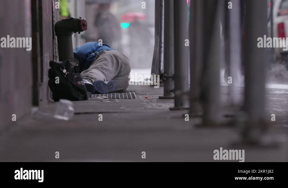 Homeless sleeping in the city Stock Videos & Footage - HD and 4K Video ...