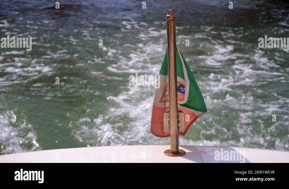 National Flag Of Italy As Civil Ensign On The Back Of Boat With ...