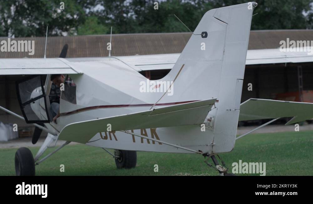 Small airplane moving flaps on preflight checking process. Plane ...