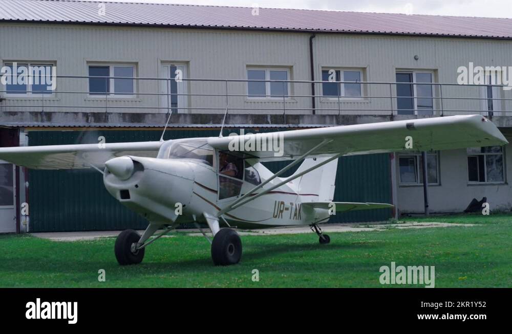 Small airplane starting accelerate ready to fly from airfield. Plane ...