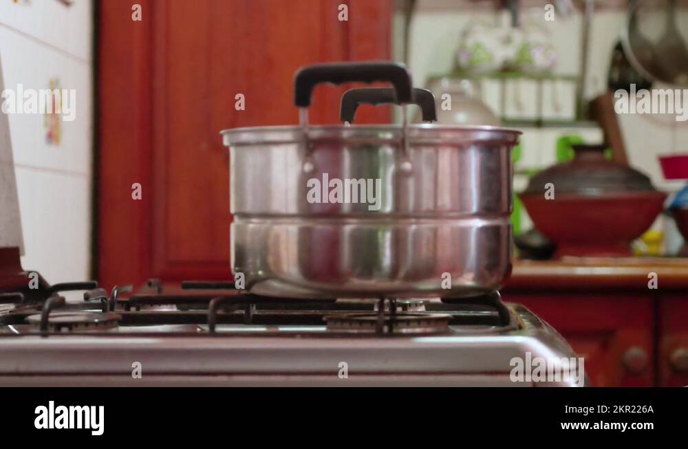 Making some Idiyappam, a traditional dish in Sri Lanka. Inside of a ...