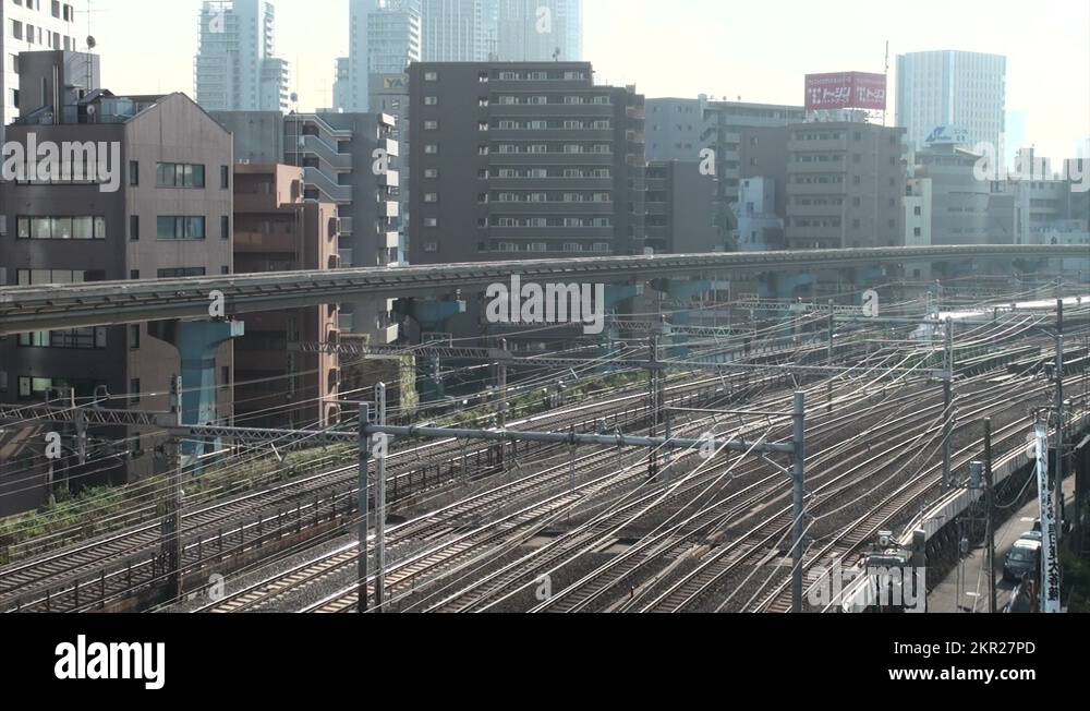 Bullet train commuter trains monorail Shinkansen downtown city Tokyo ...