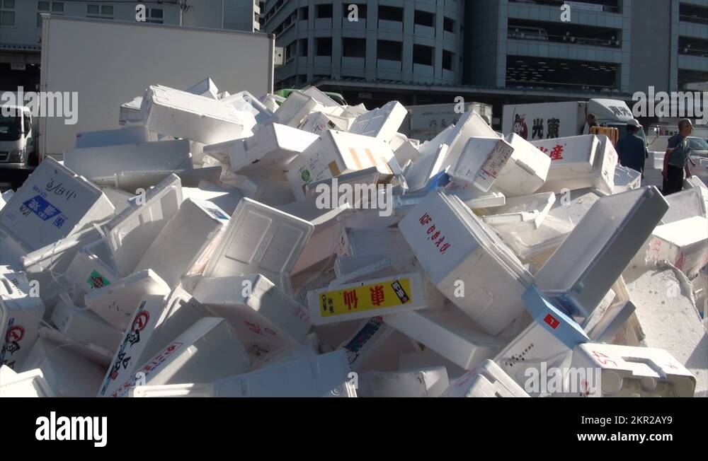 Fork lift gathers foam boxes for recycling at the Tsukiji fish market ...