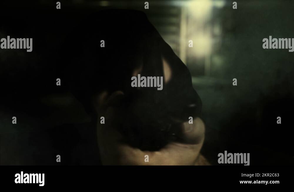 Masked Commando Man with Gun in Scary Alley Stock Video Footage - Alamy