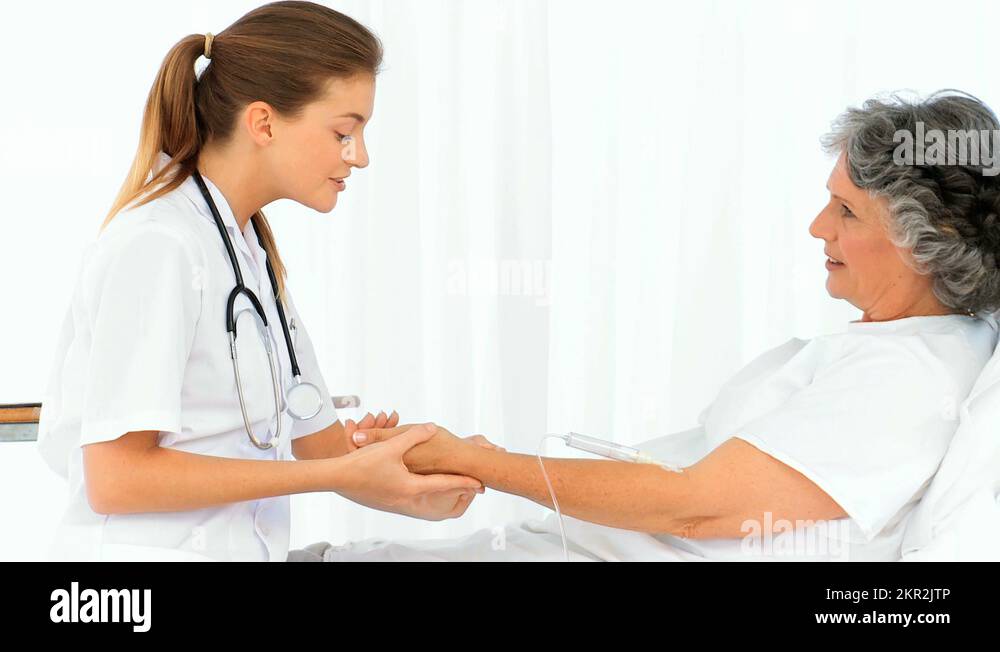 Beautiful nurse taking pulse patient Stock Videos & Footage - HD and 4K ...