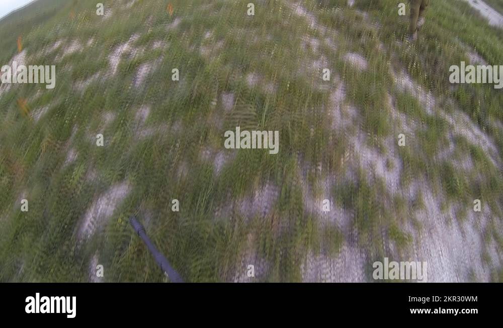 armed soldiers walking through field. soldiers running with Machine gun ...