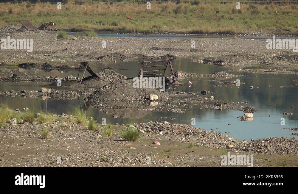 People picking stones in Sibalom river in the Republic of the ...