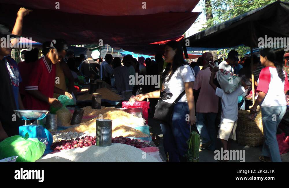Busy local street market at Sibalom city in the Republic of the ...