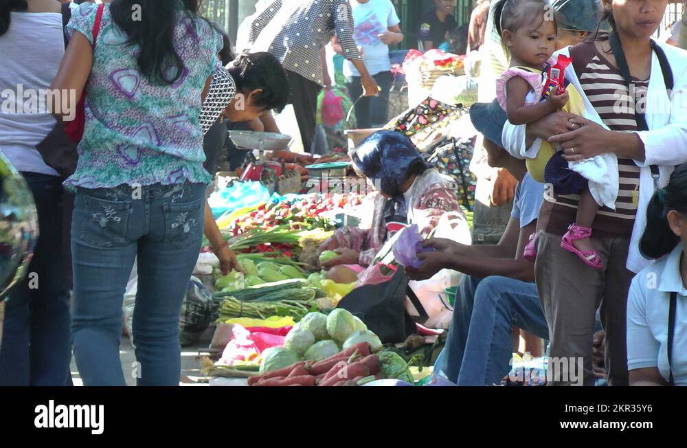 Busy local street market at Sibalom city in the Republic of the ...