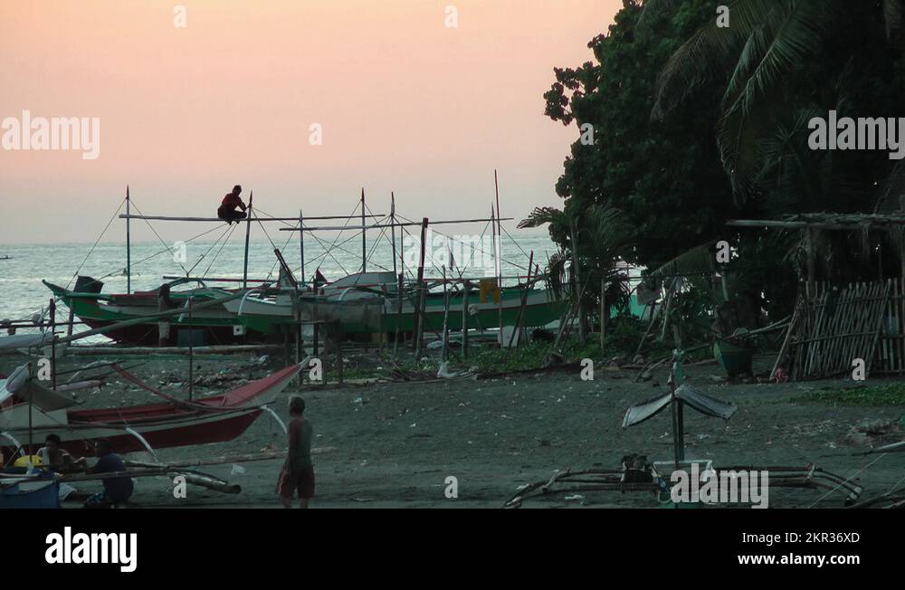 Traditional filipino banka outrigger boats on Datu Sumakwel Beach in ...