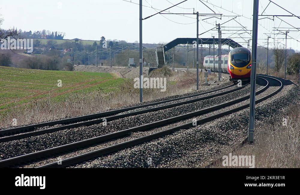 Virgin Trains Pendolino tilting train on a curve on West Coast mainline ...