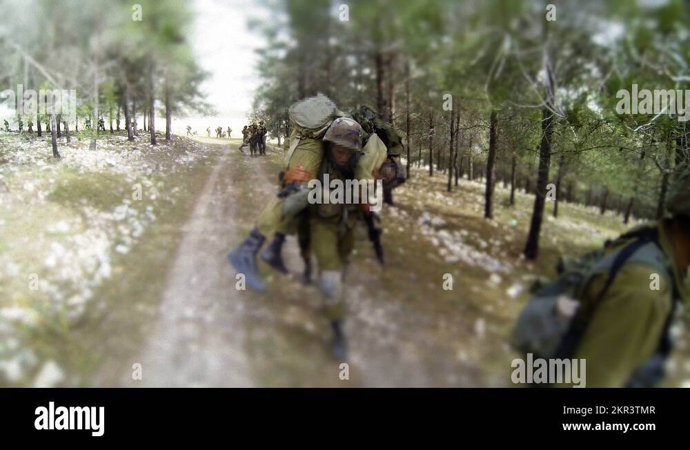 armed soldiers walking through field. soldiers running with Machine gun ...