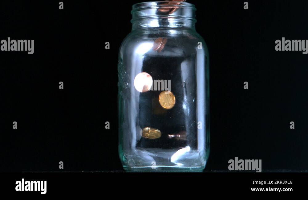 Pouring coin jar Stock Videos & Footage - HD and 4K Video Clips - Alamy
