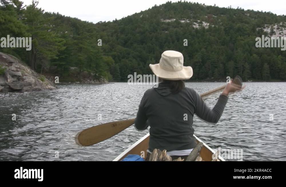 Woman canoe rain Stock Videos & Footage - HD and 4K Video Clips - Alamy