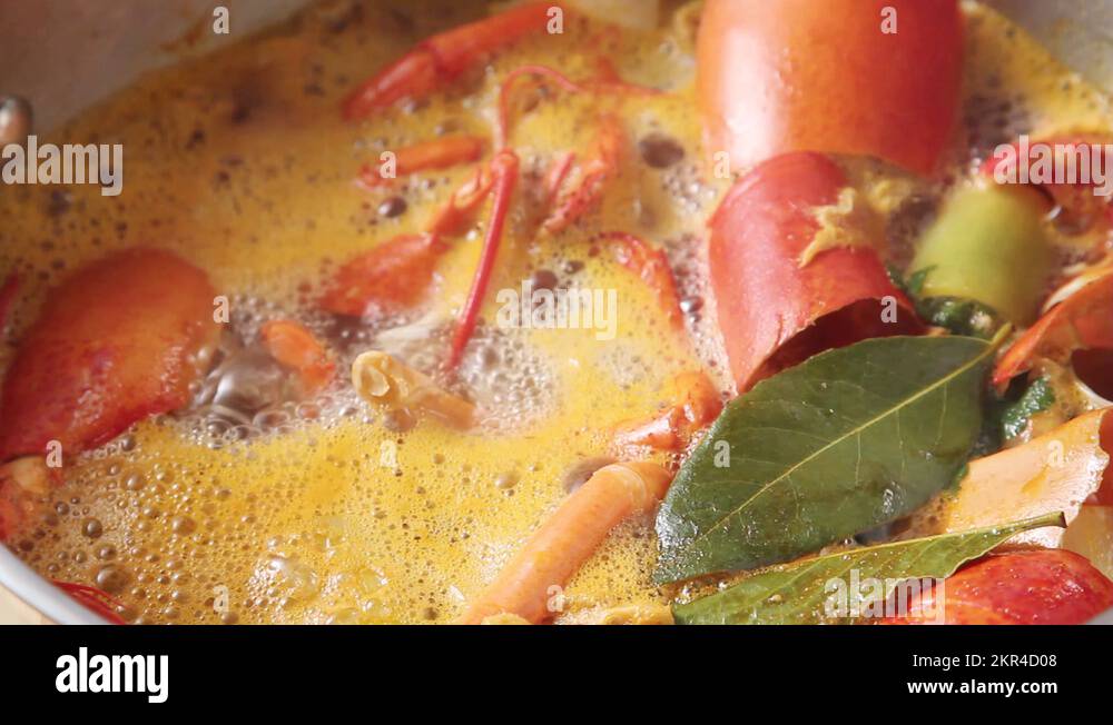 Skimming the scum off lobster stock Stock Video Footage - Alamy