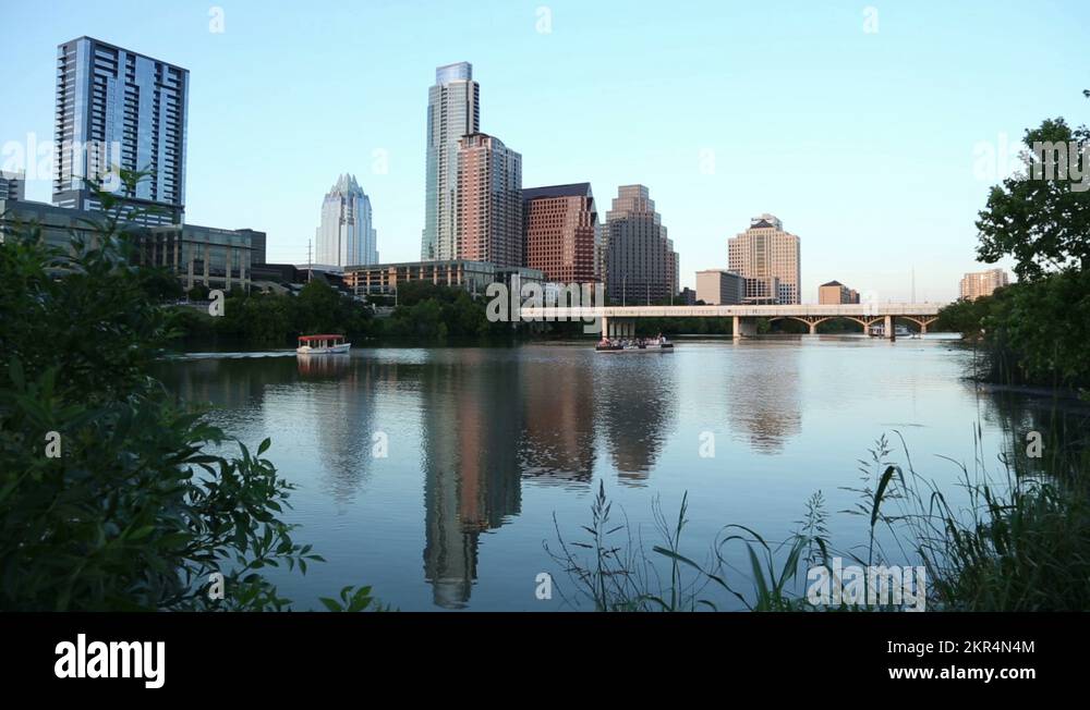 late light on lady bird lake with austin skyline in background, texas ...