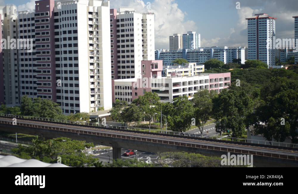 Singapore MRT with HDB in the background Stock Video Footage - Alamy