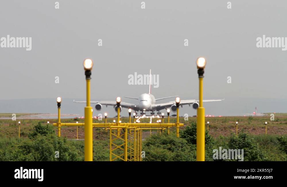 Airplane lands at manchester airport, emirates, airbus, a380 Stock ...