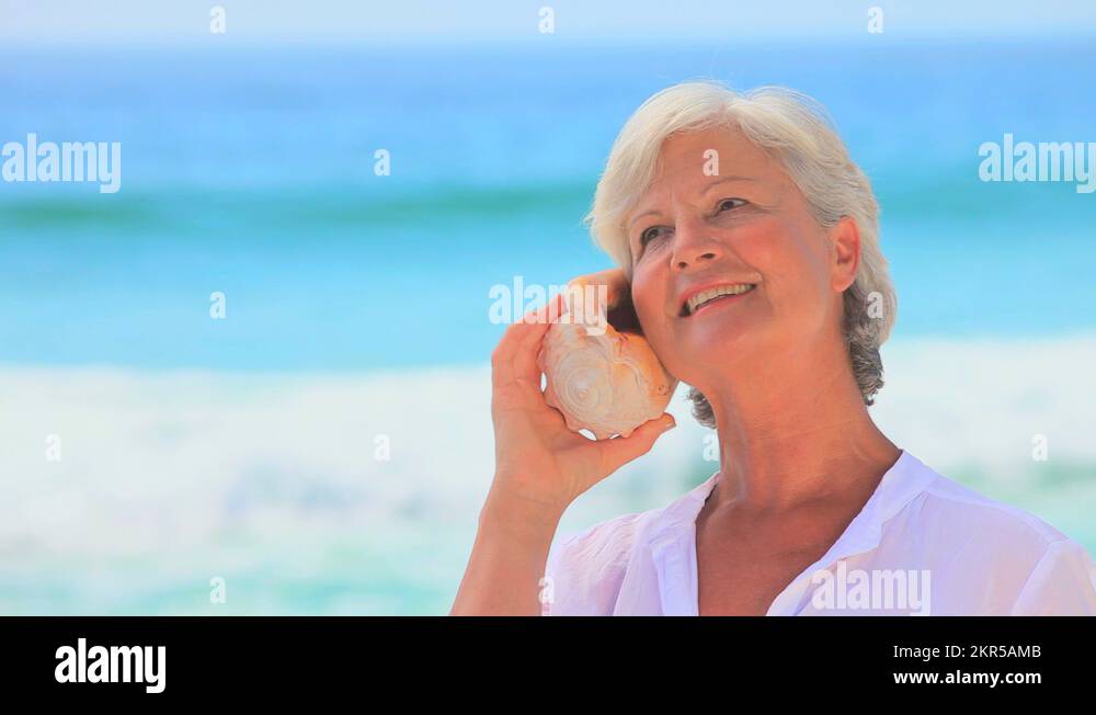 White shell woman Stock Videos & Footage - HD and 4K Video Clips - Alamy