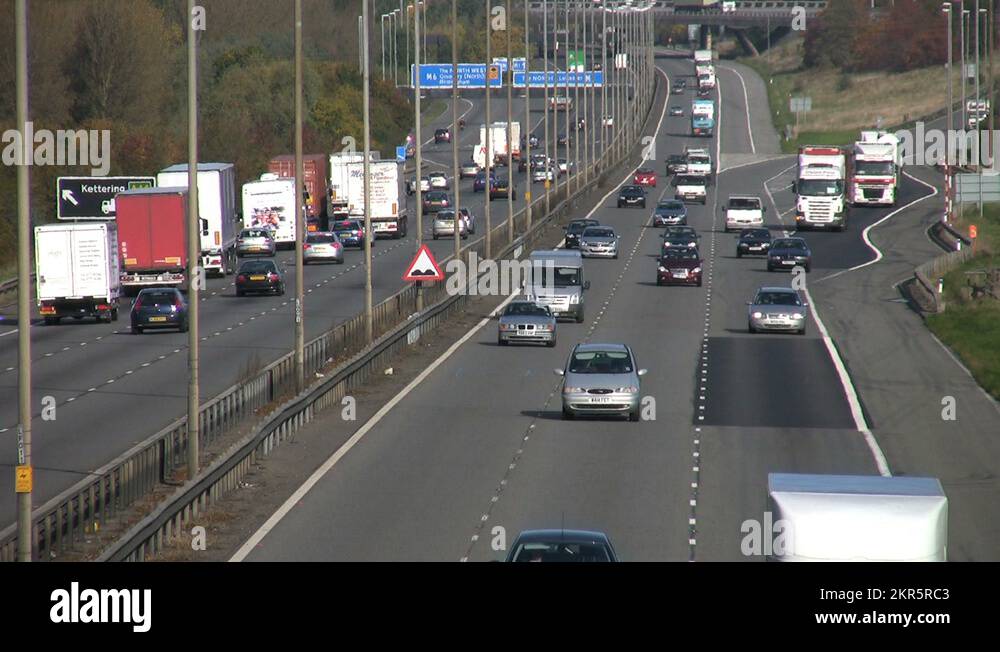 Traffic on the M1 motorway at the M6 junction Northamptonshire England ...