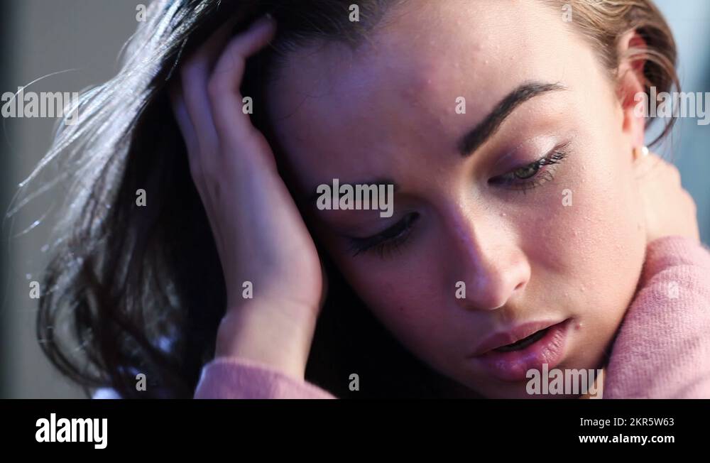 Sad depressed woman teenage girl portrait Stock Video Footage - Alamy