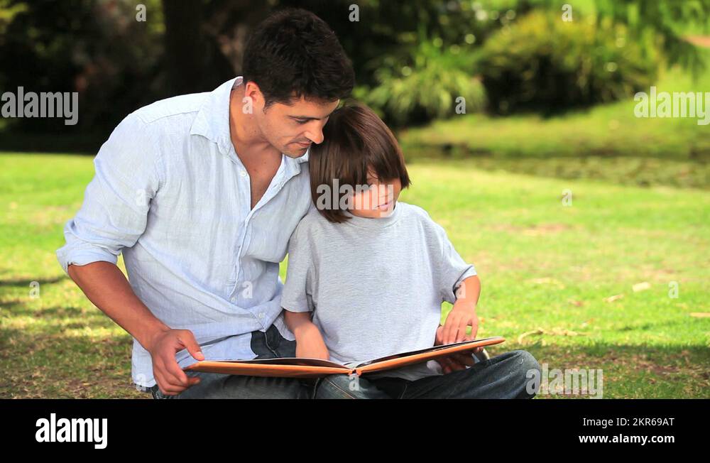 Father son sitting on grass Stock Videos & Footage - HD and 4K Video ...