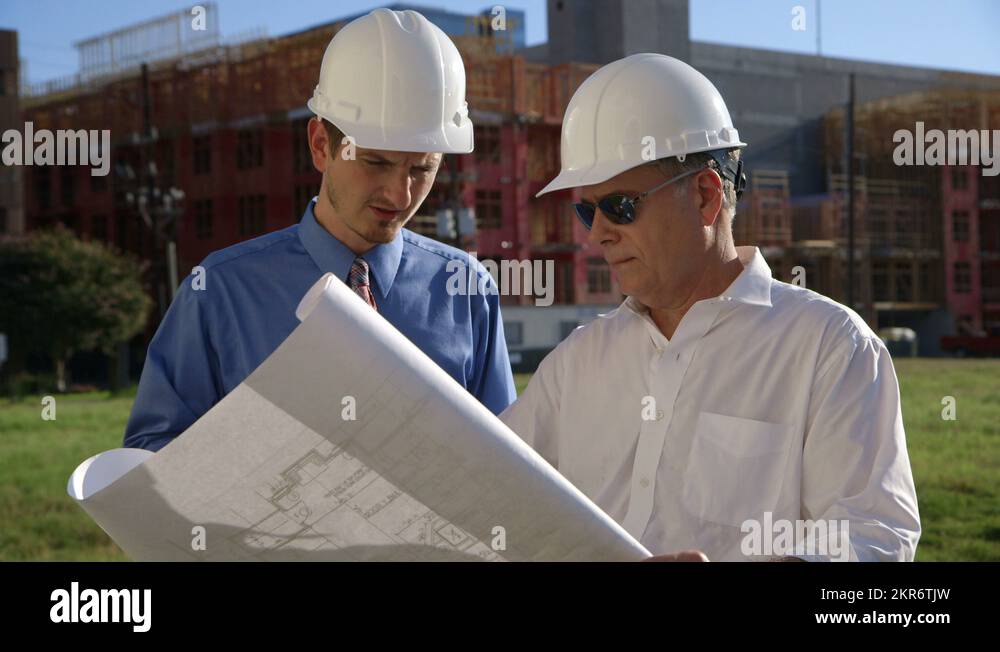 Two men reviewing plans Stock Videos & Footage - HD and 4K Video Clips ...