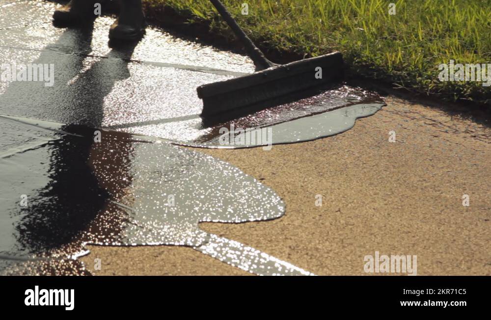 Driveway coating Stock Videos & Footage - HD and 4K Video Clips - Alamy