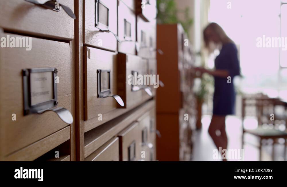 Girl filing paper Stock Videos & Footage - HD and 4K Video Clips - Alamy