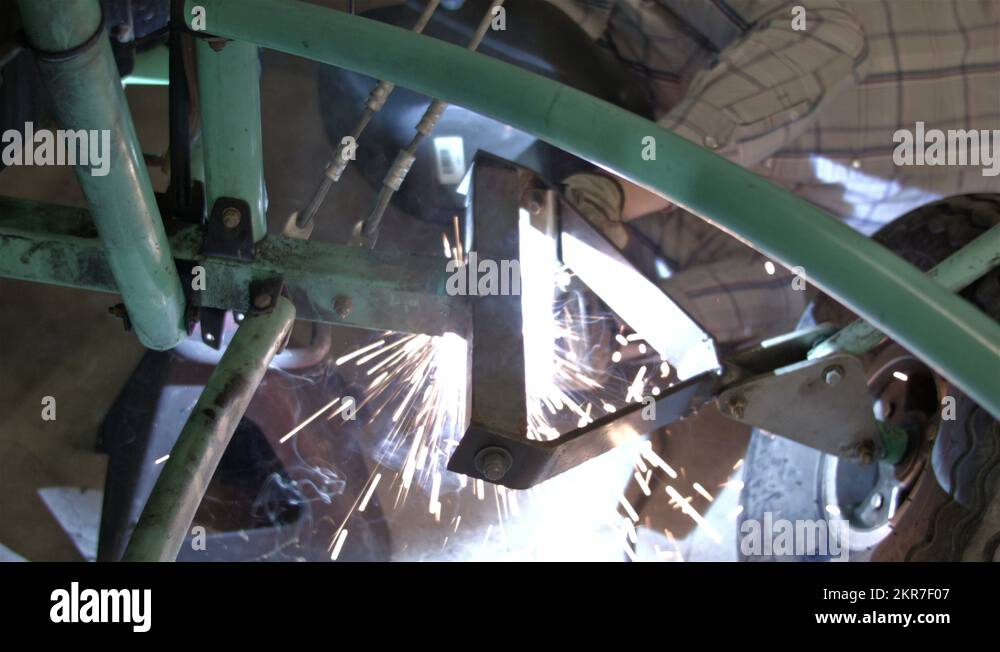 Mechanic welding axle Stock Videos & Footage - HD and 4K Video Clips ...