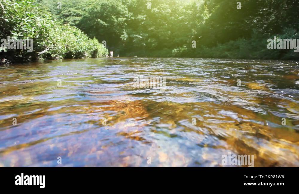Rippling water and currents of a flowing river in HD Stock Video ...