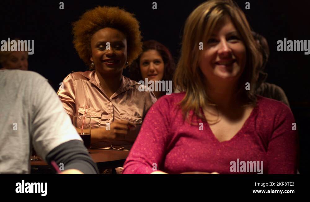 People in the audience clap at the end of the comics show Stock Video ...