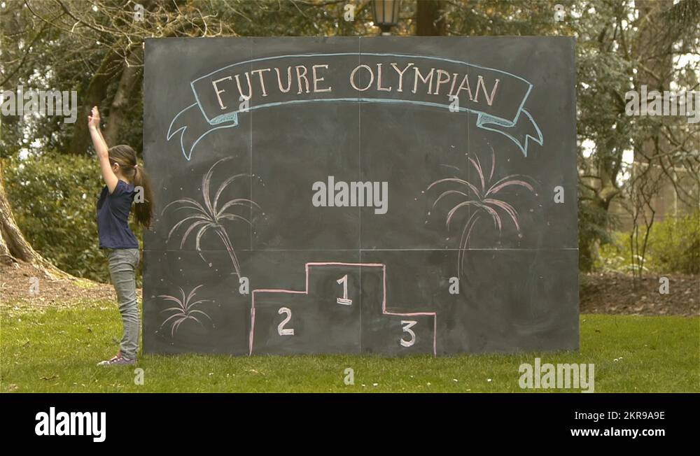Cute Girl Sticks Back Flip Landing; Chalkboard with "Future Olympian ...