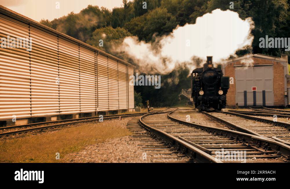 steam engine locomotive. nostalgic. smoke puffing. industrial ...